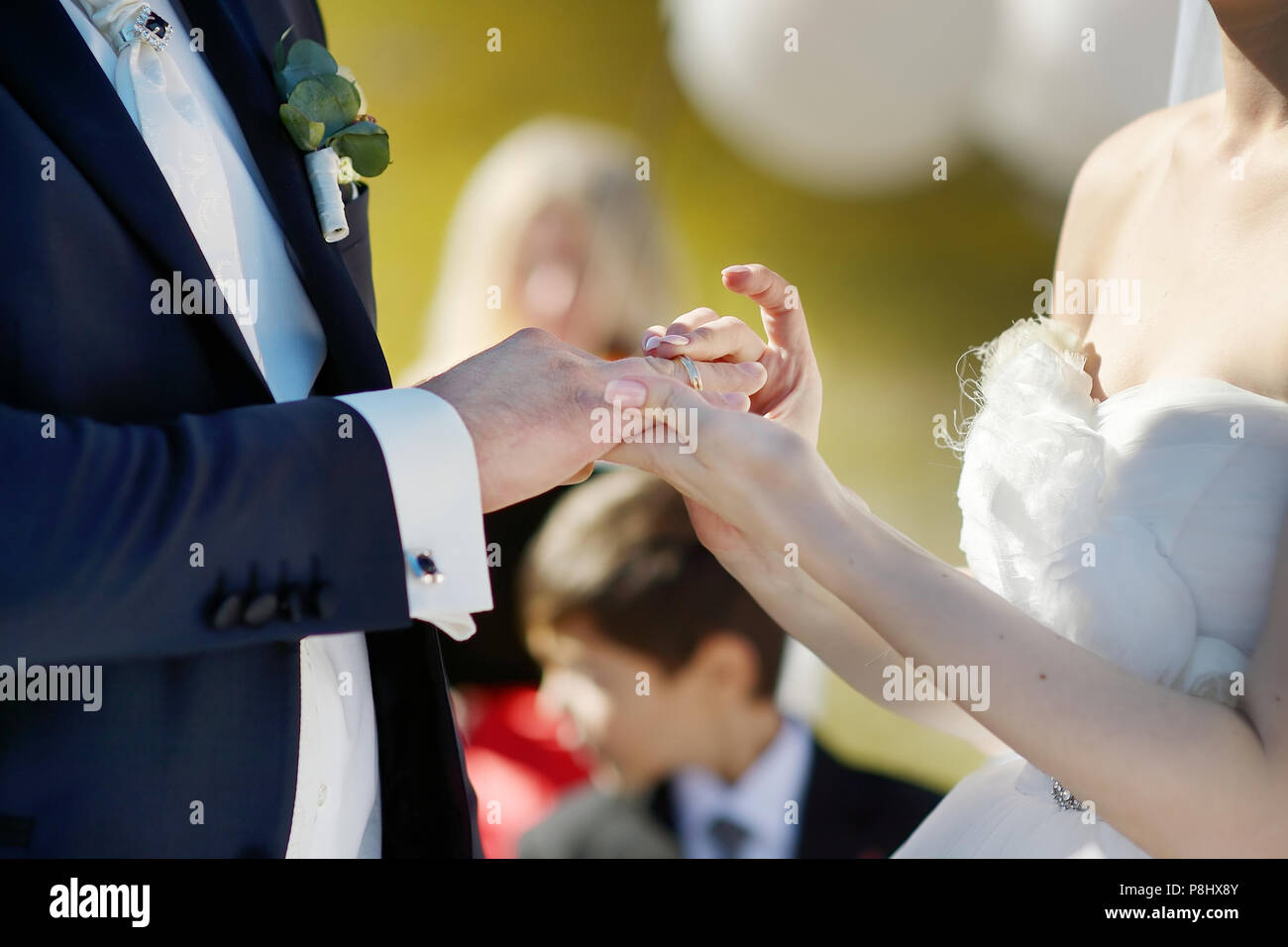 Girl putting on ring hi-res stock photography and images - Alamy