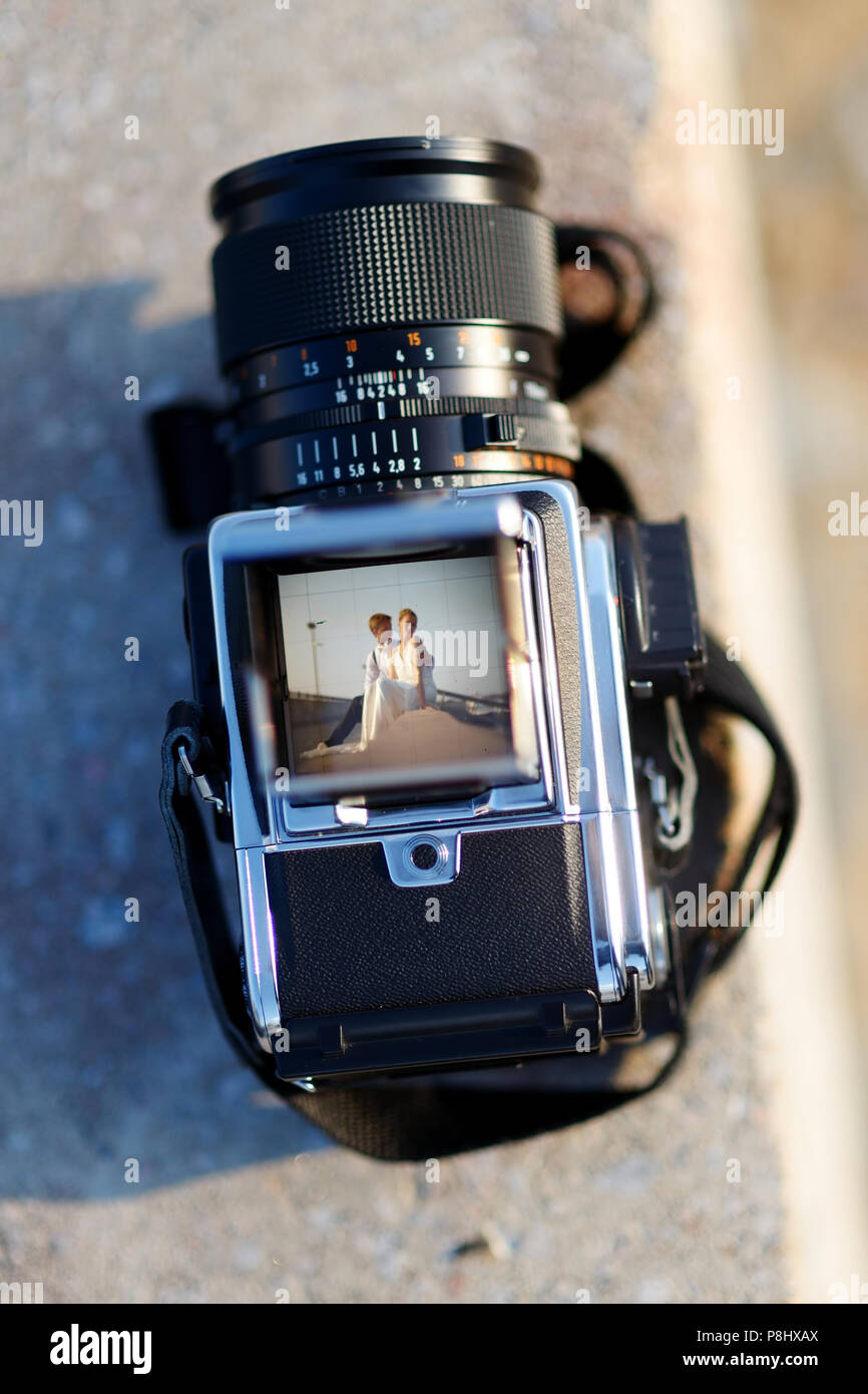 Shooting a wedding with a vintage oldschool camera Stock Photo - Alamy
