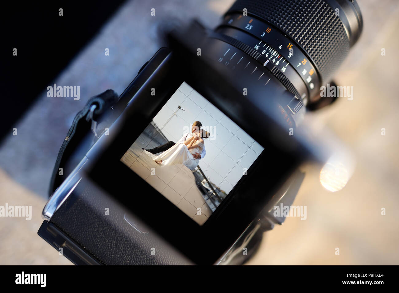 Shooting a wedding with a vintage oldschool camera Stock Photo - Alamy