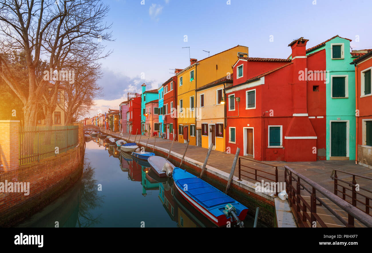 Street with colorful buildings in Burano island, Venice, Italy ...