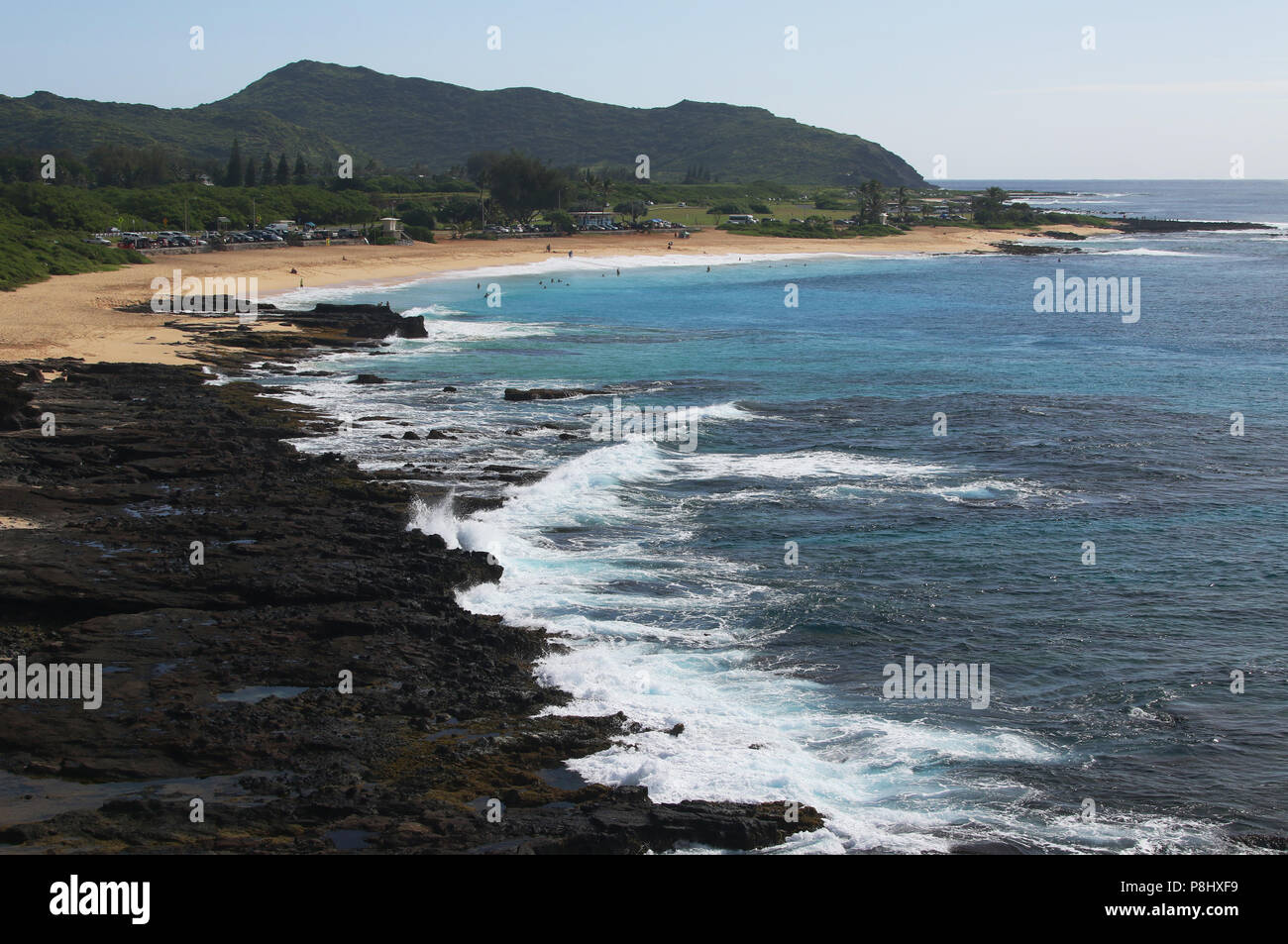 Halona Cove shoreline, including a volcanic rock beach and Sandy Beach ...