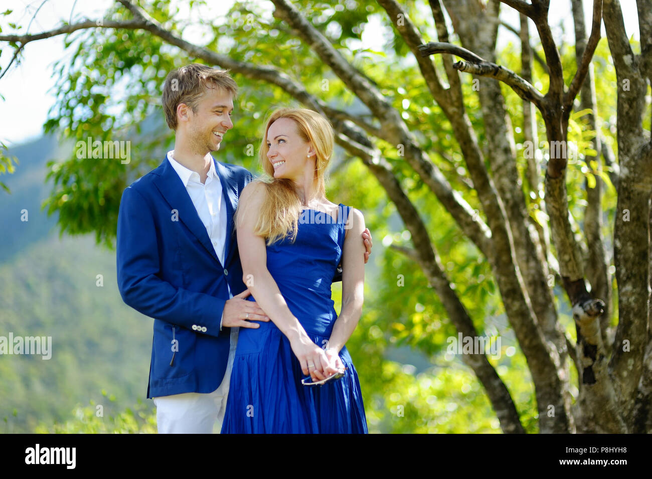 Young beautiful couple on a tropical island Stock Photo - Alamy