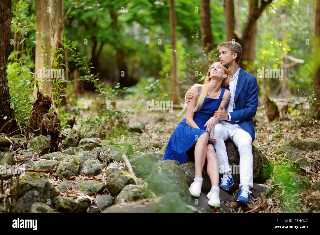 Beautiful young couple having fun in the park hi-res stock photography ...