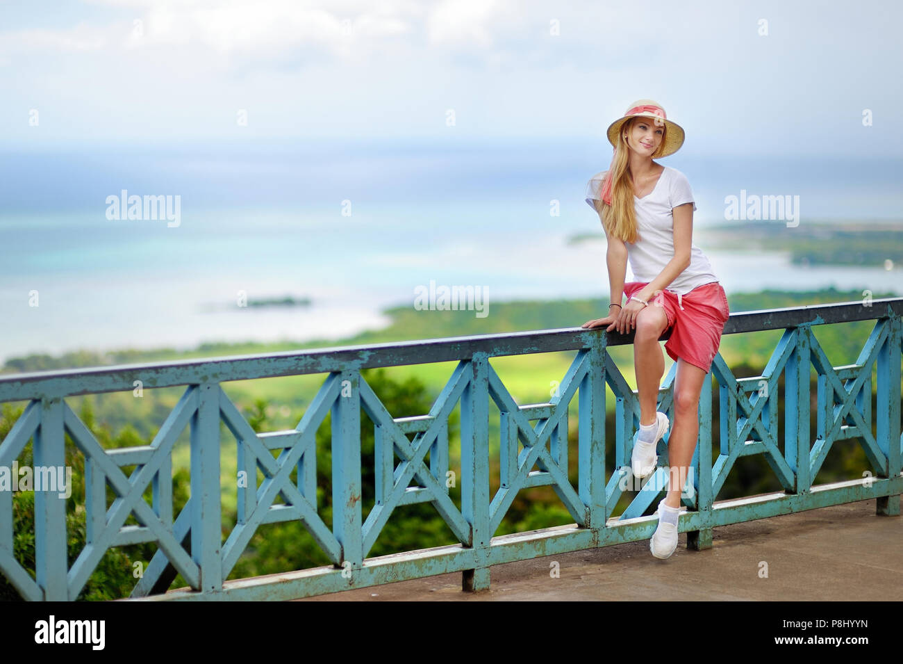 Beautiful woman enjoying a view on Mauritius Stock Photo - Alamy