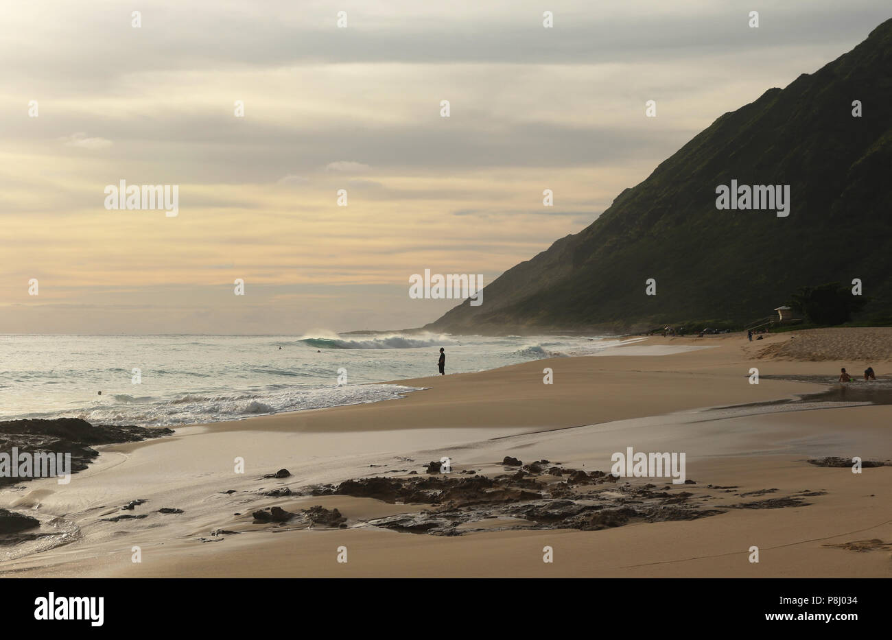 Beach scene at Keawaula Beach, north of Makaha. People visible ...