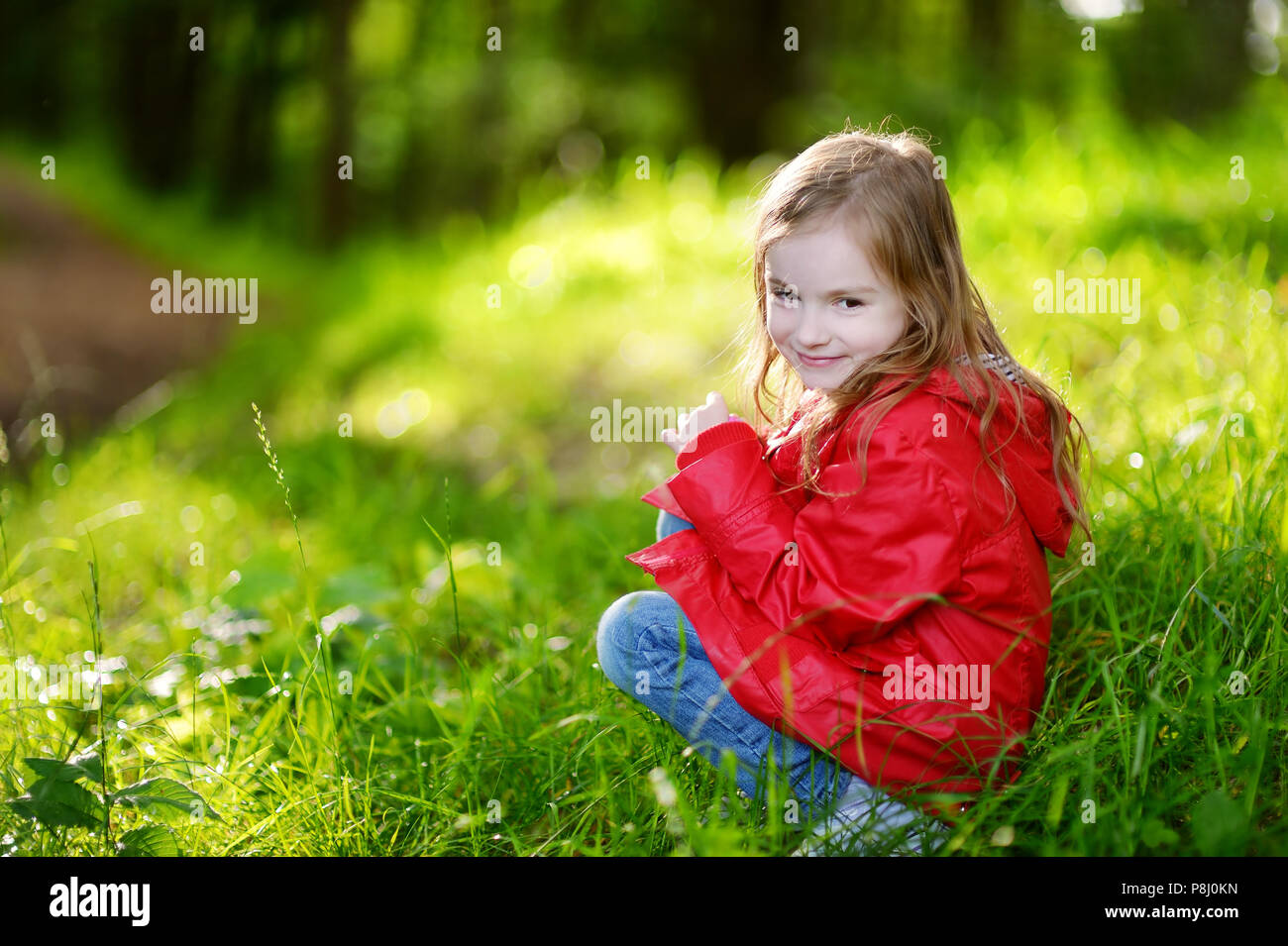 Girl wearing red jacket hi-res stock photography and images - Alamy