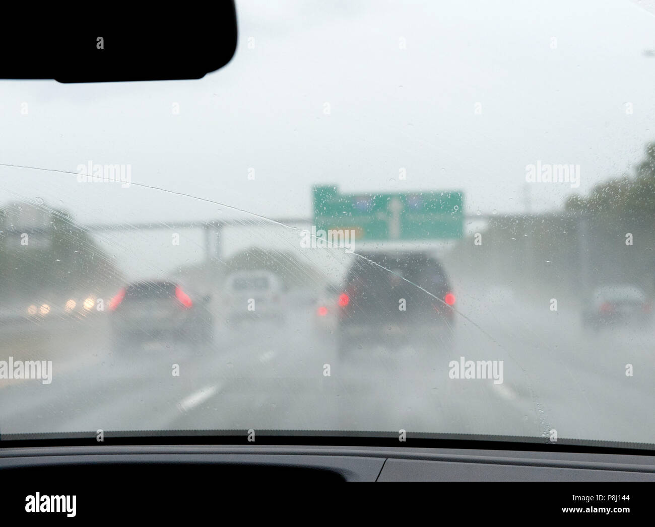 School bus in rain storm hi-res stock photography and images - Alamy