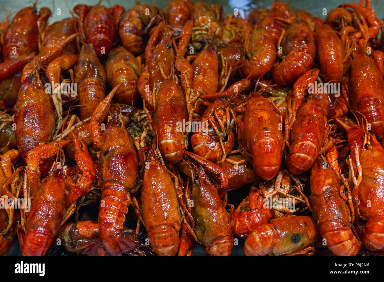 River crayfish on the counter of the Chinese market. Prepared according ...