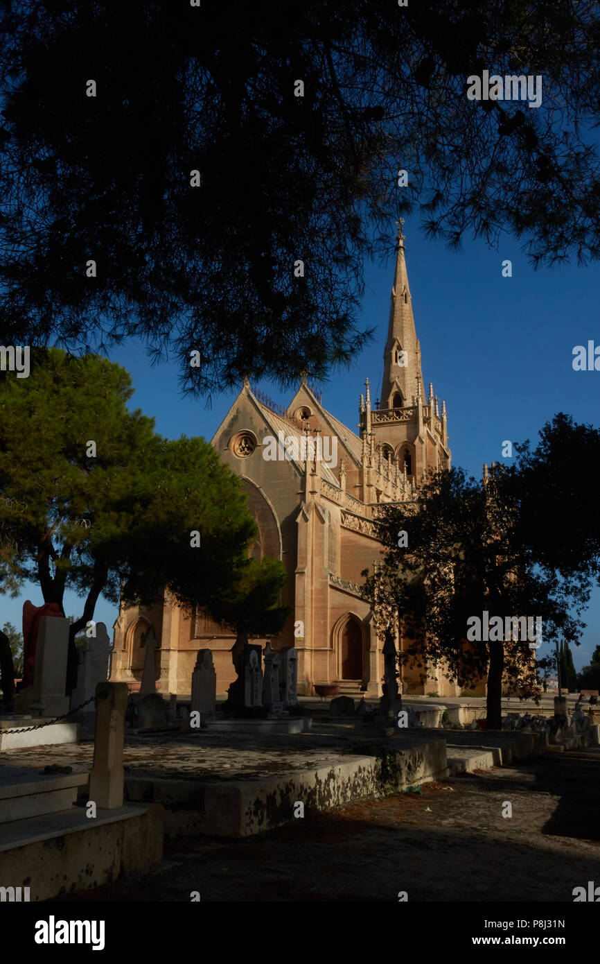 trees framing the Addolorata Cemetery chapel in Malta Stock Photo - Alamy