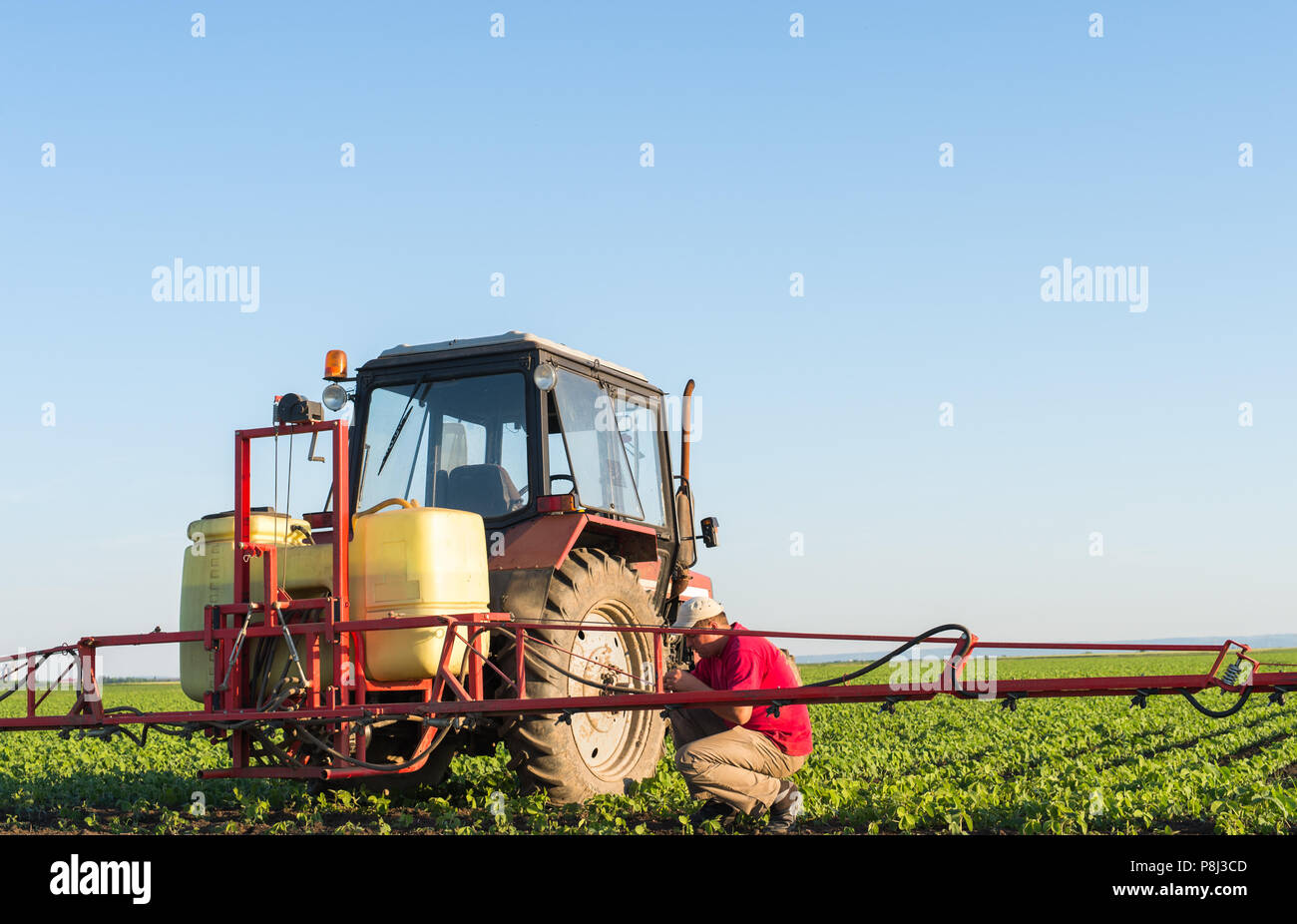 repair of tractors in field Stock Photo - Alamy