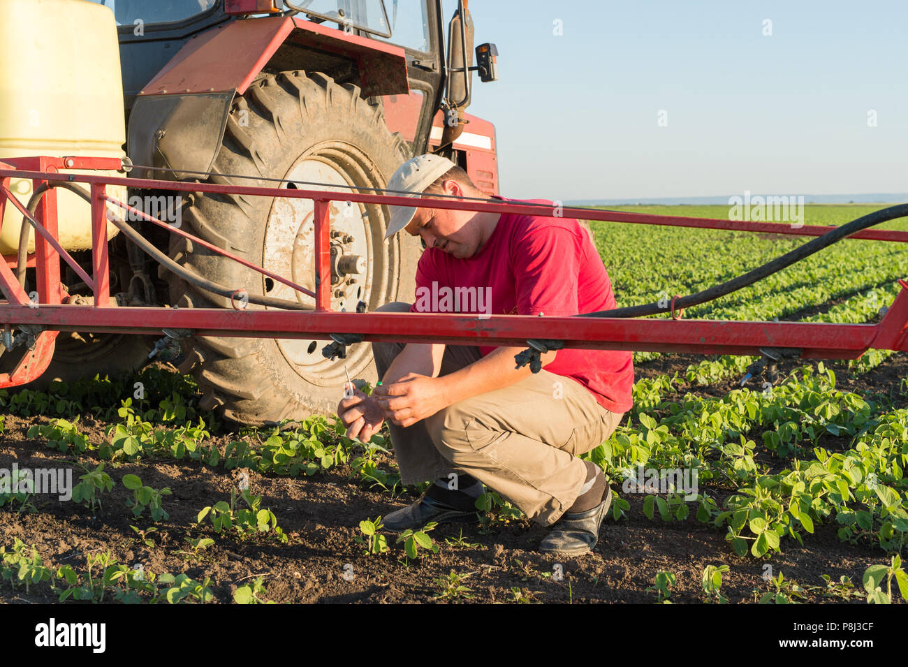 repair of tractors in field Stock Photo - Alamy
