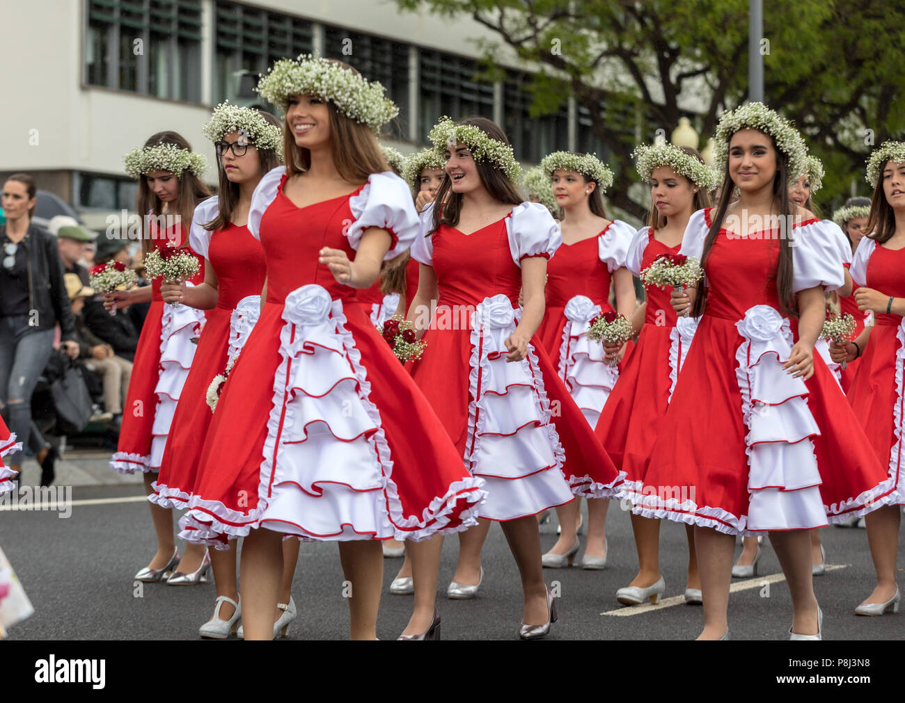 Funchal; Madeira; Portugal - April 22; 2018: A group of women in red ...