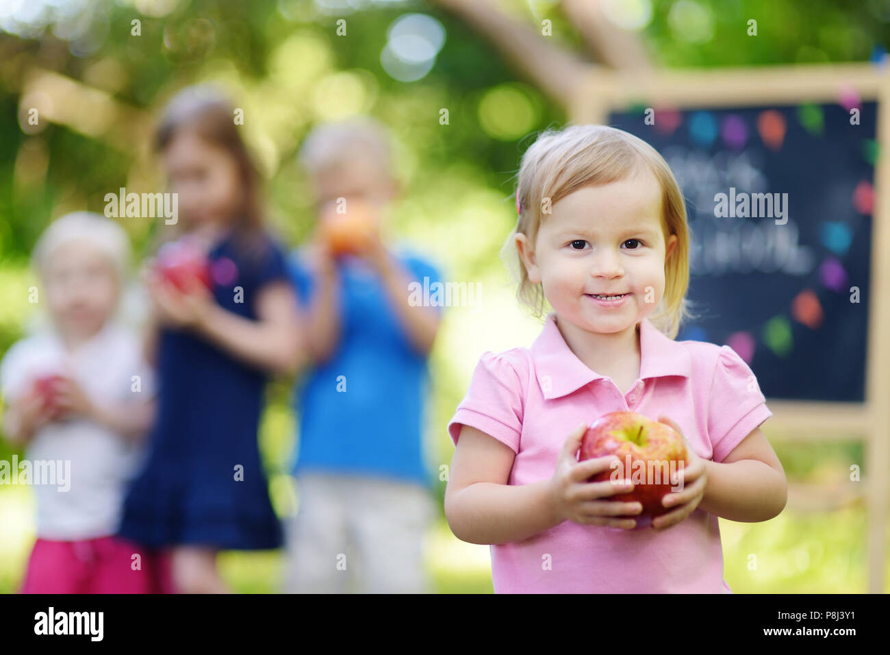 Adorable little girl feeling excited about going to preschool for the ...