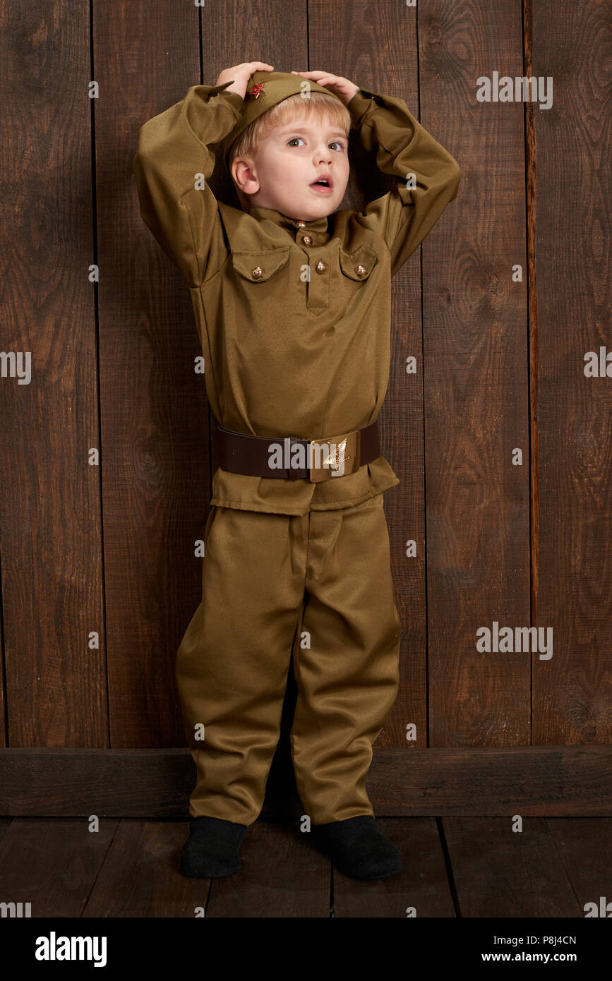 children are dressed as soldier in retro military uniforms Stock Photo ...
