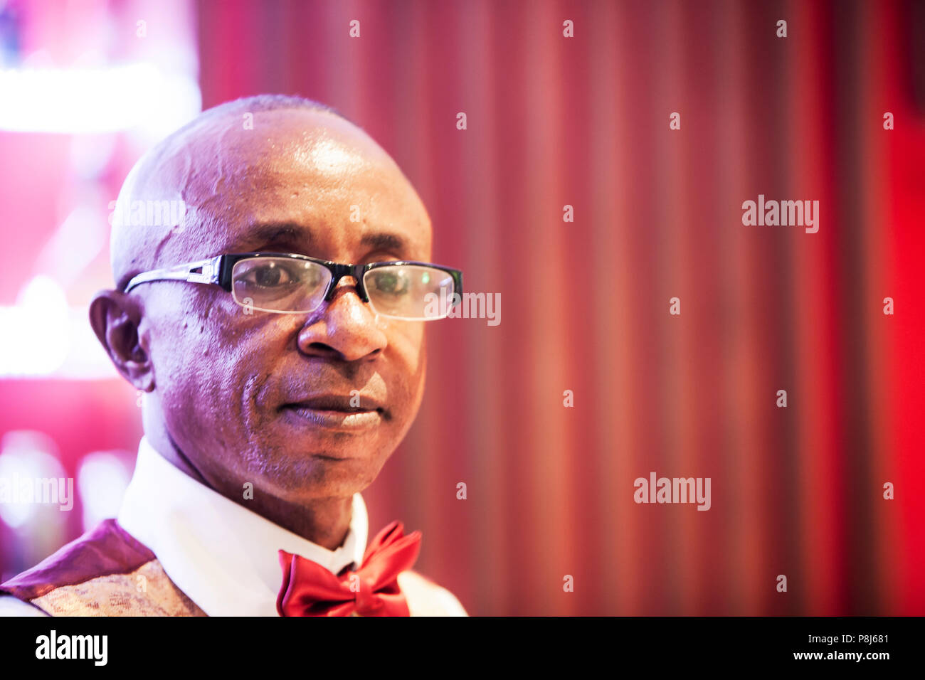 POINTNOIRE/CONGO - 18MAY2013 - Portrait of classic African Bartender ...