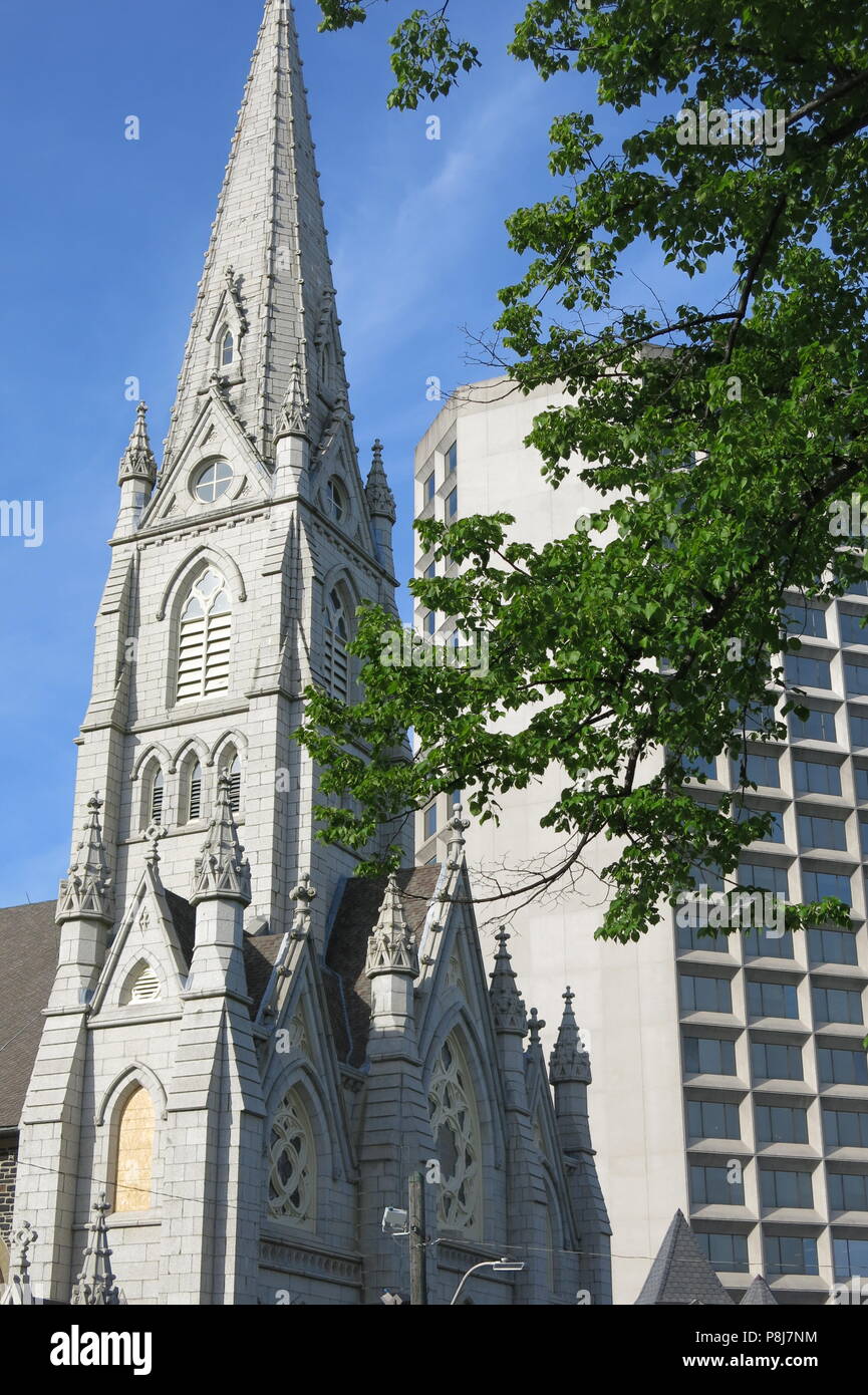 The contrast of ancient and modern with the granite spire (tallest in N ...