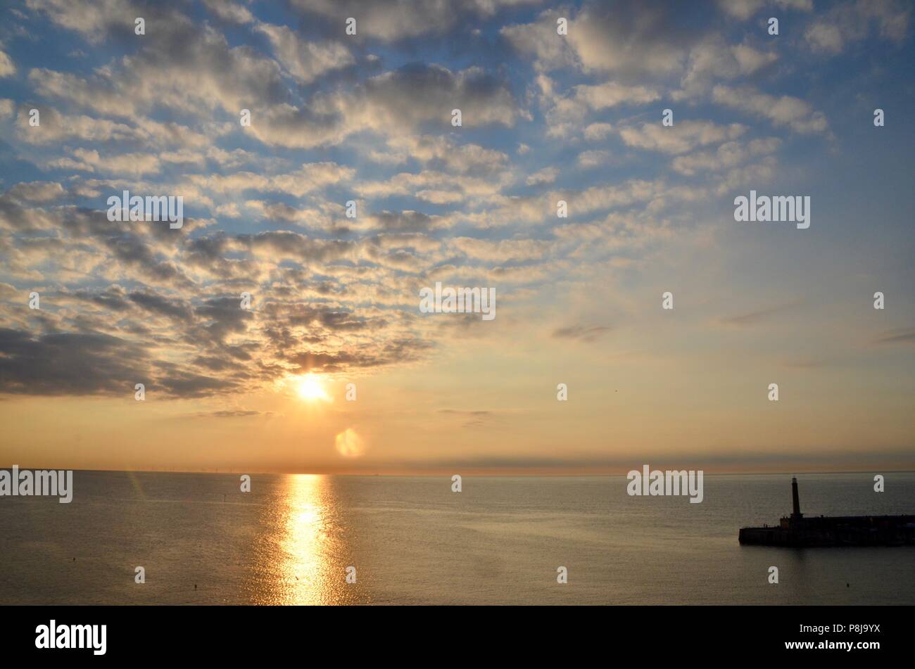 the sunsets over margate harbour and beach kent UK Stock Photo - Alamy