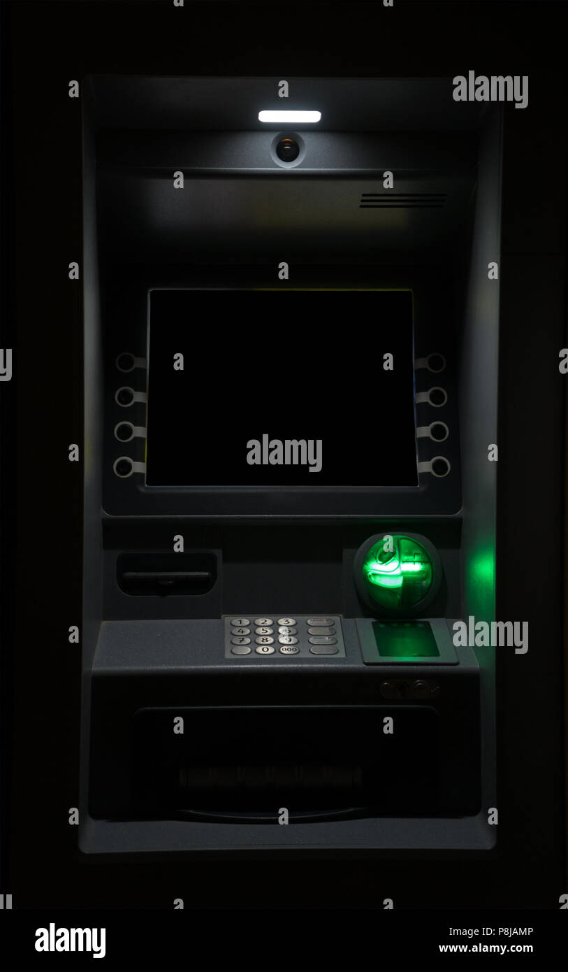 ATM machine at night. Black screen for text Stock Photo - Alamy