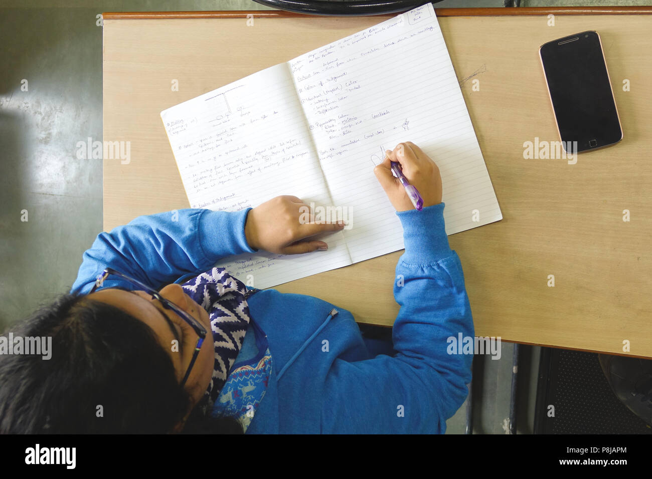 Indian college girl in class hi-res stock photography and images - Alamy