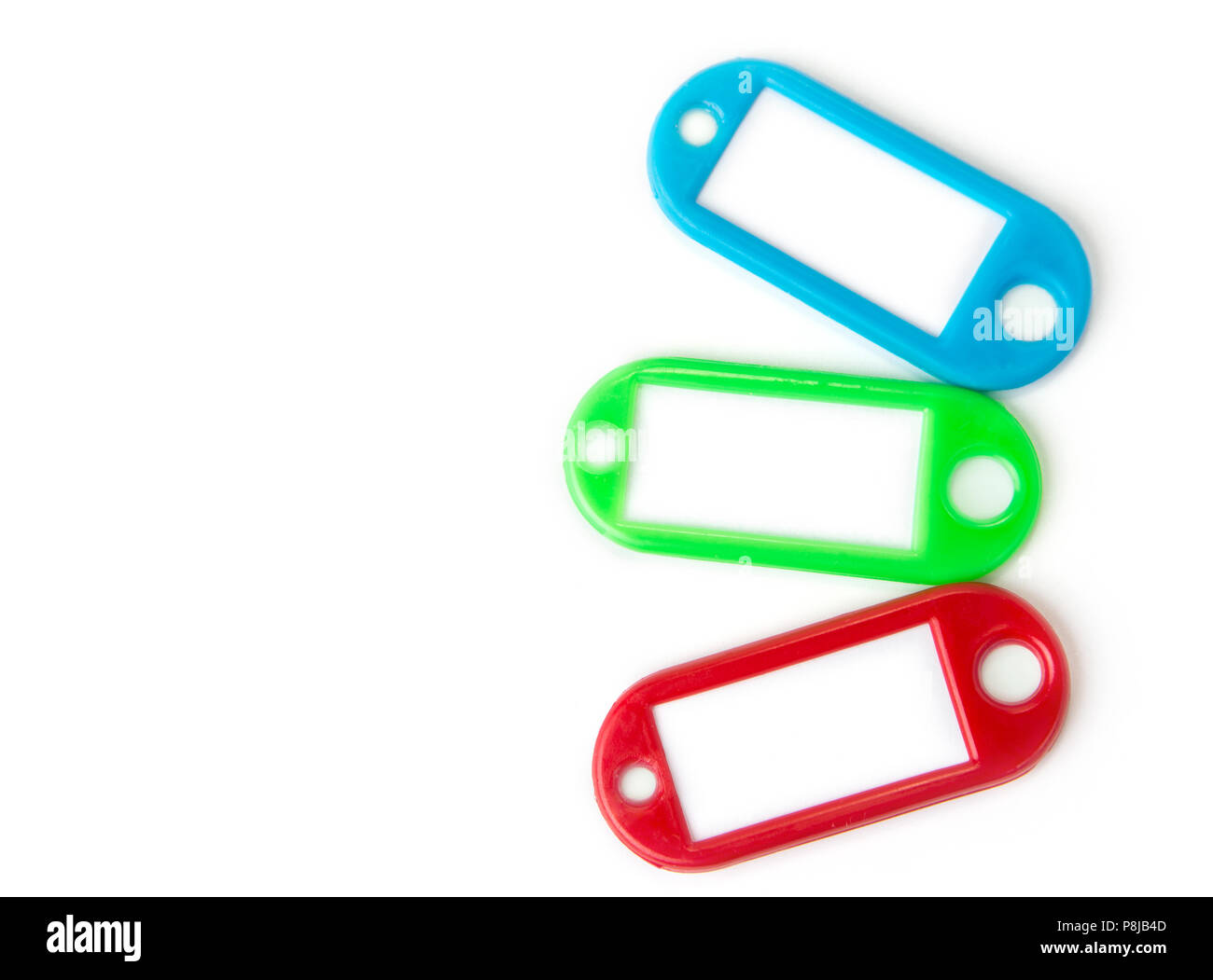 Blank key fob in various colors on the white Stock Photo - Alamy