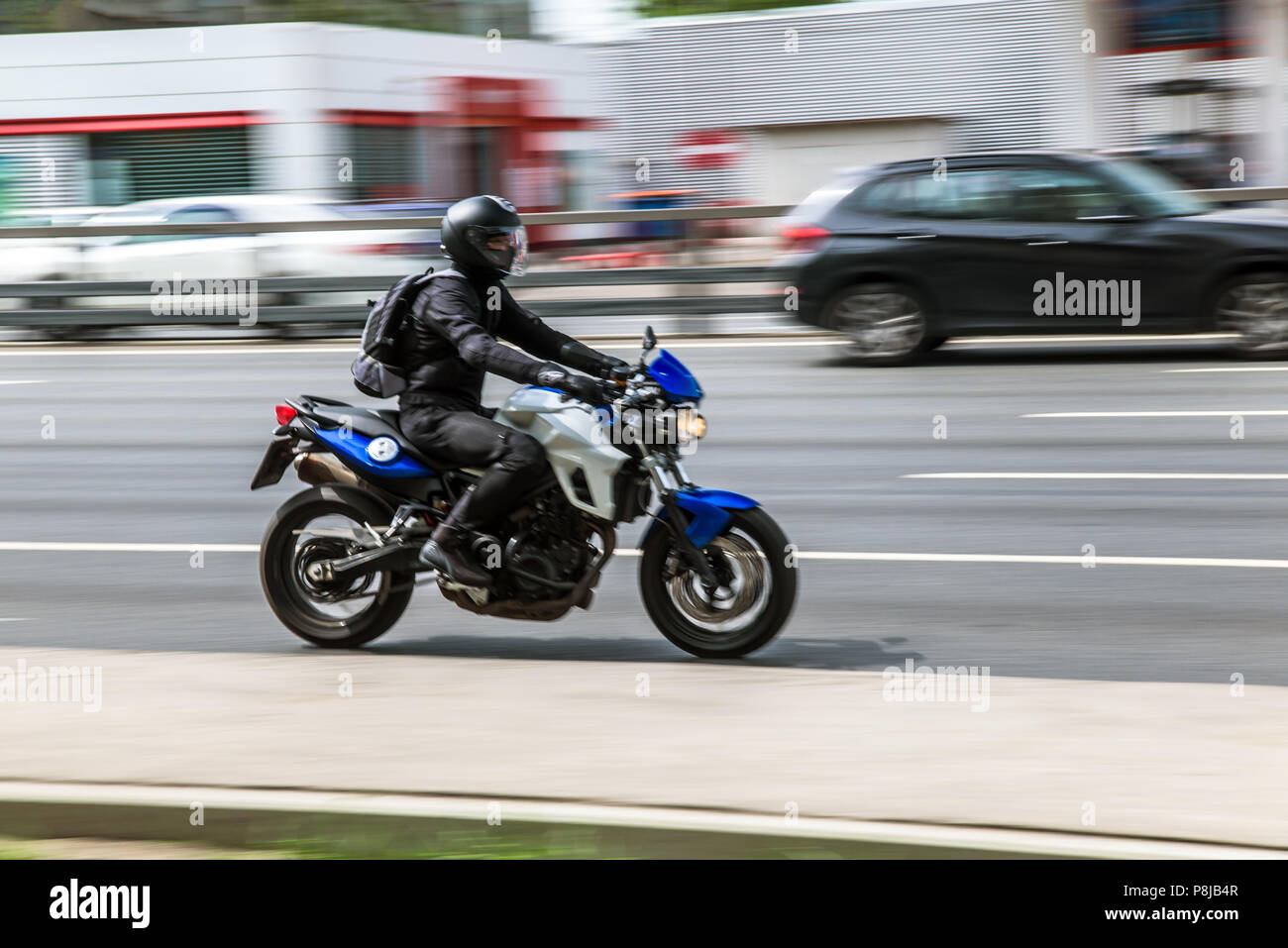 Motorcycle ride fast on highway hi-res stock photography and images - Alamy