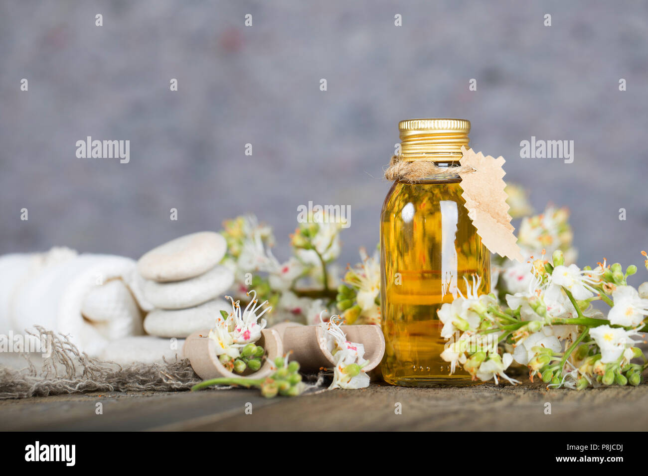 Glass bottle of horse chestnut oil extract. Closeup Stock Photo - Alamy