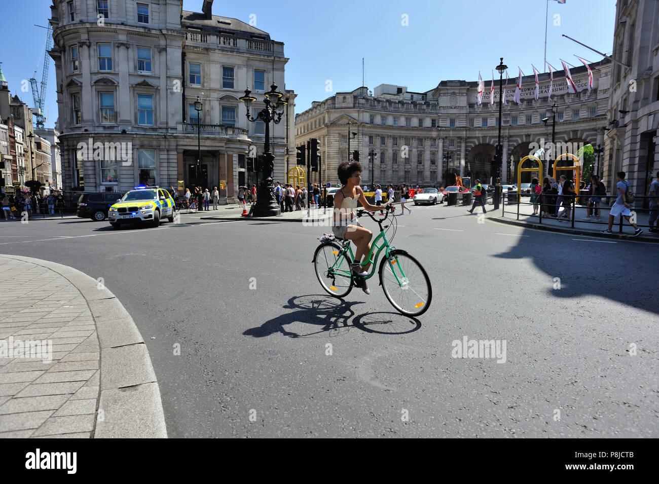 Woman Cycling in London, England, UK Stock Photo - Alamy