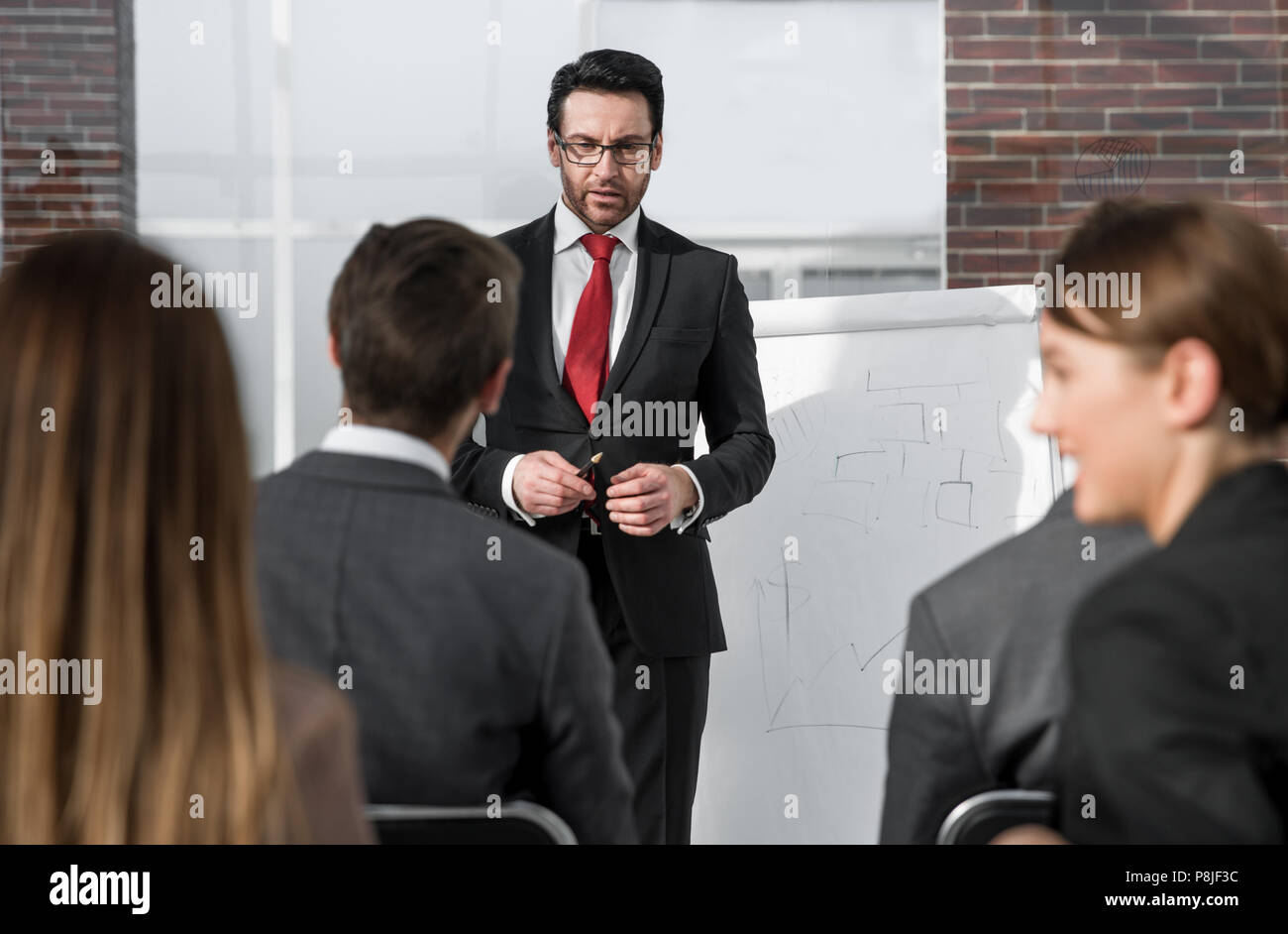 Stylish businessman doing a presentation Stock Photo - Alamy