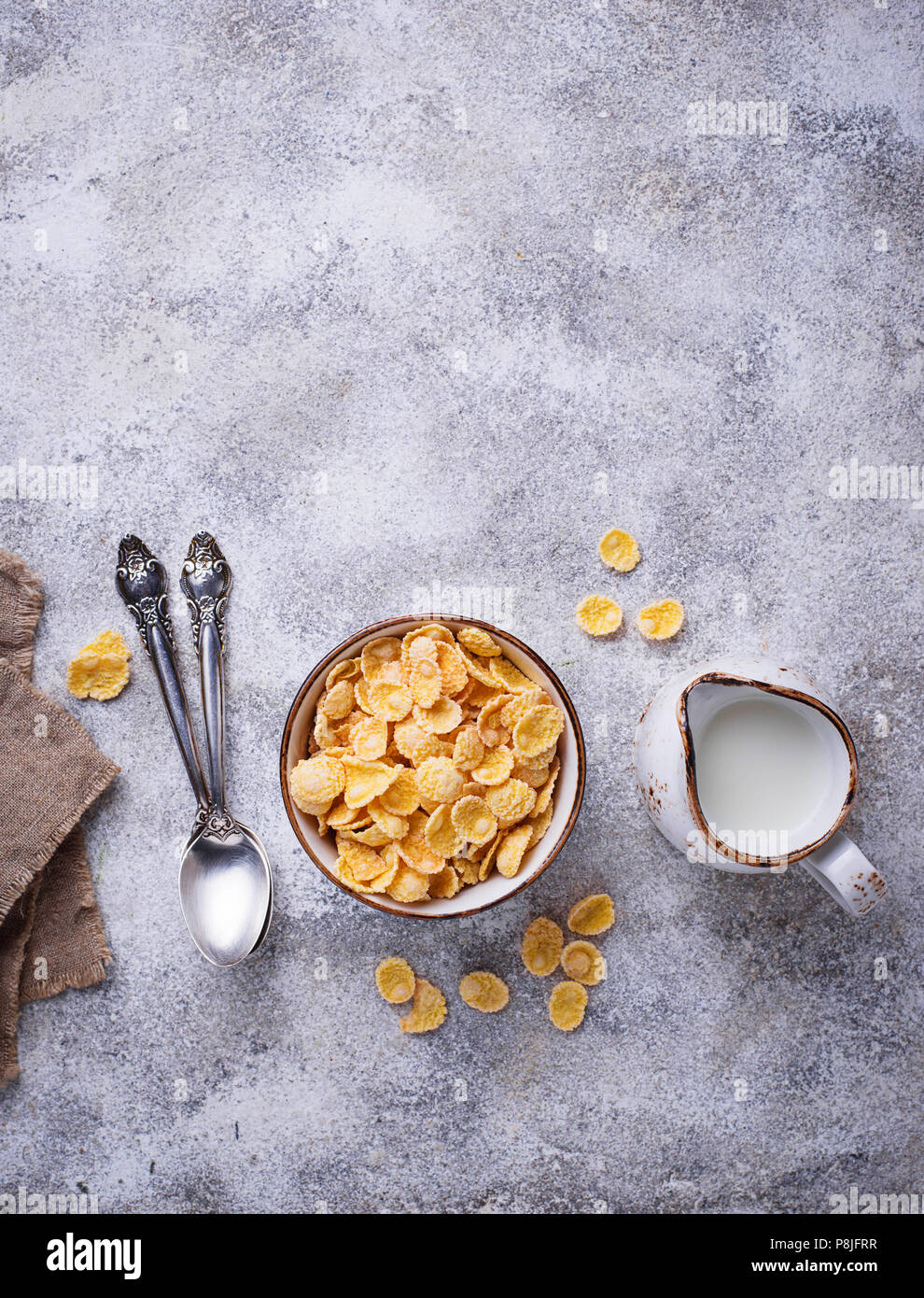 Sweet cereal corn flakes in bowl Stock Photo - Alamy