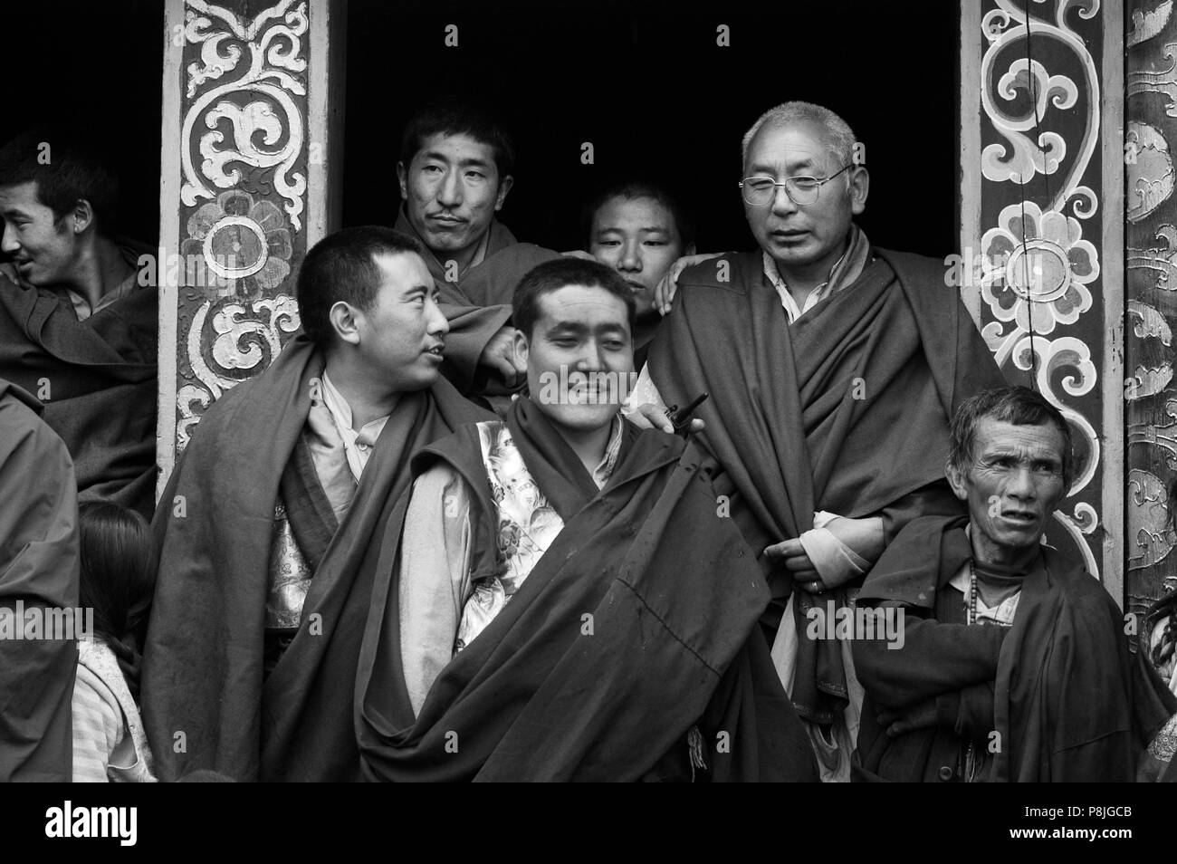 Buddhist monks in doorway, Nyingma Cham Dances, Katok Dorjeden ...