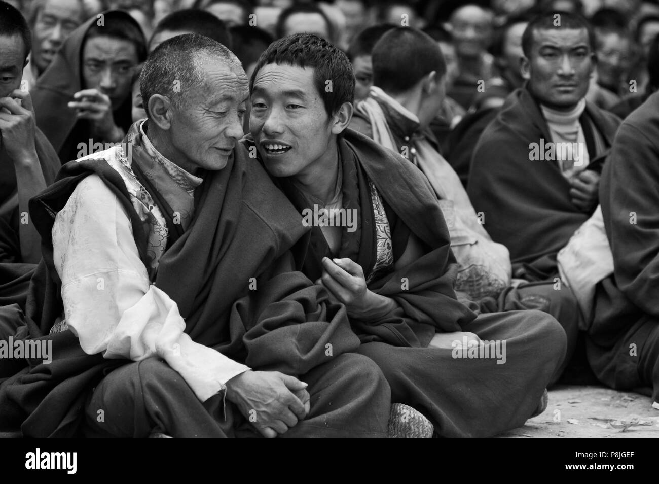 Buddhist monks talk at the Cham Dances, Katok Dorjeden Monastery - Kham ...