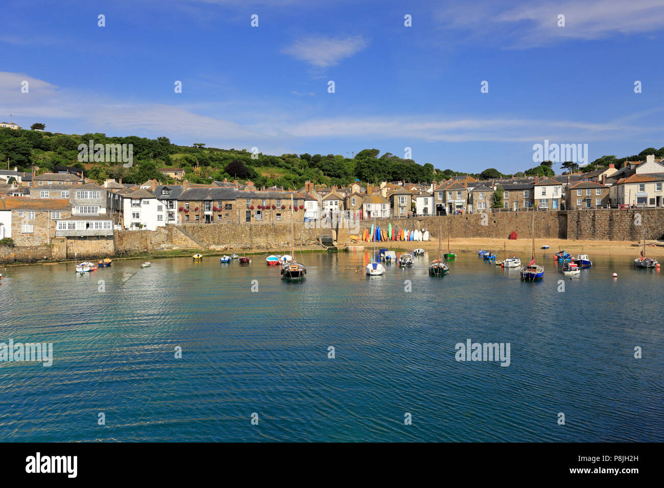 Boats in Mousehole harbour, Cornwall, England, UK Stock Photo - Alamy