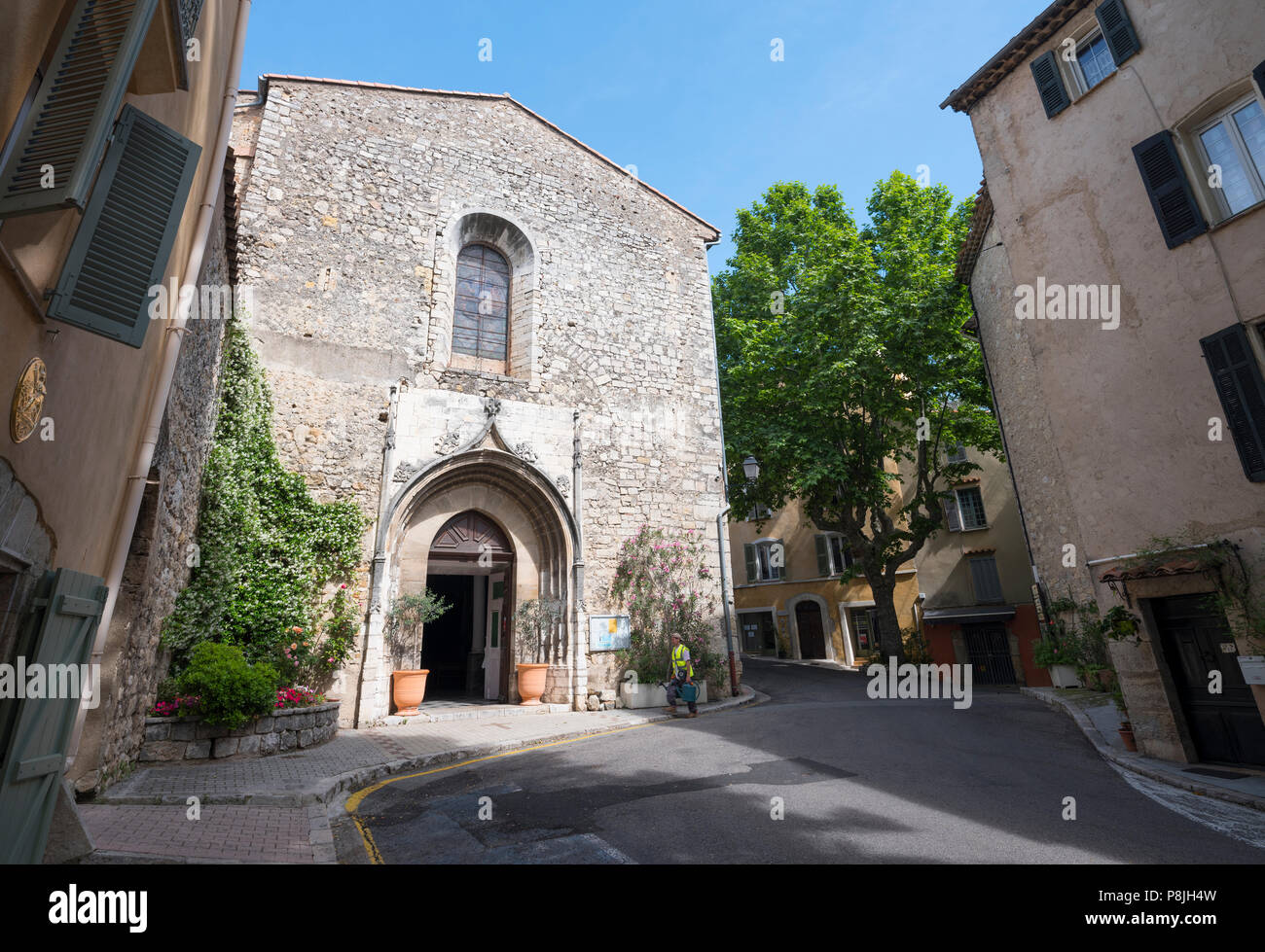 bargemon, france, 13 june 2018: man with watering can waters the plants ...