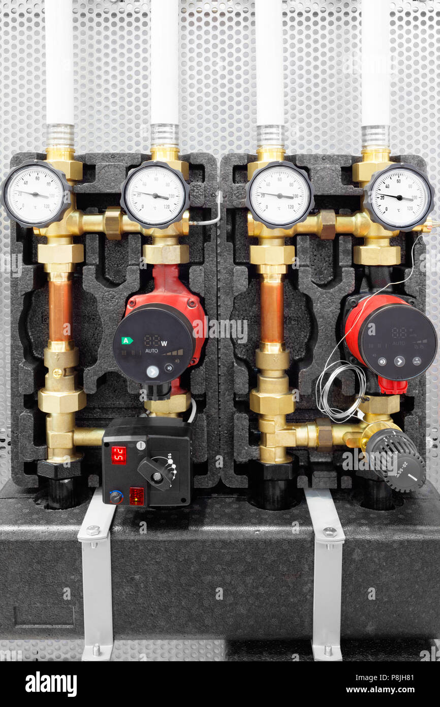 Close up of manometer, pipe, flow meter, water pumps and valves of ...
