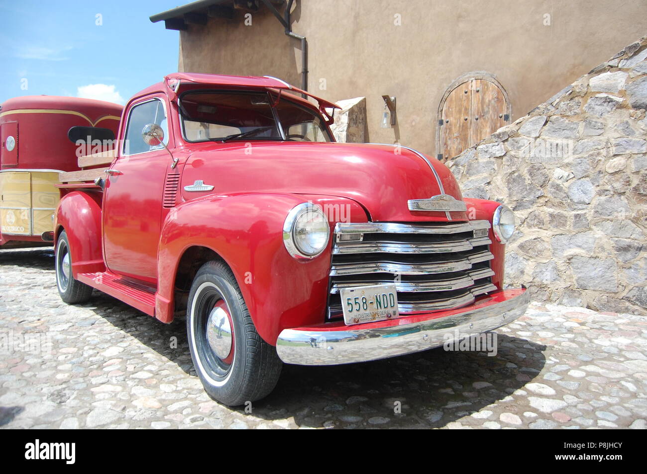 Old fancy shiny red truck Stock Photo - Alamy