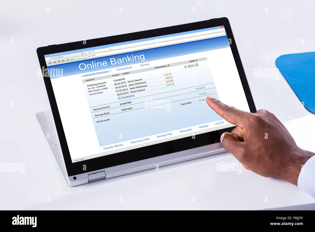 Close-up Of Businessman's Hand Pointing The Online Banking Form On ...