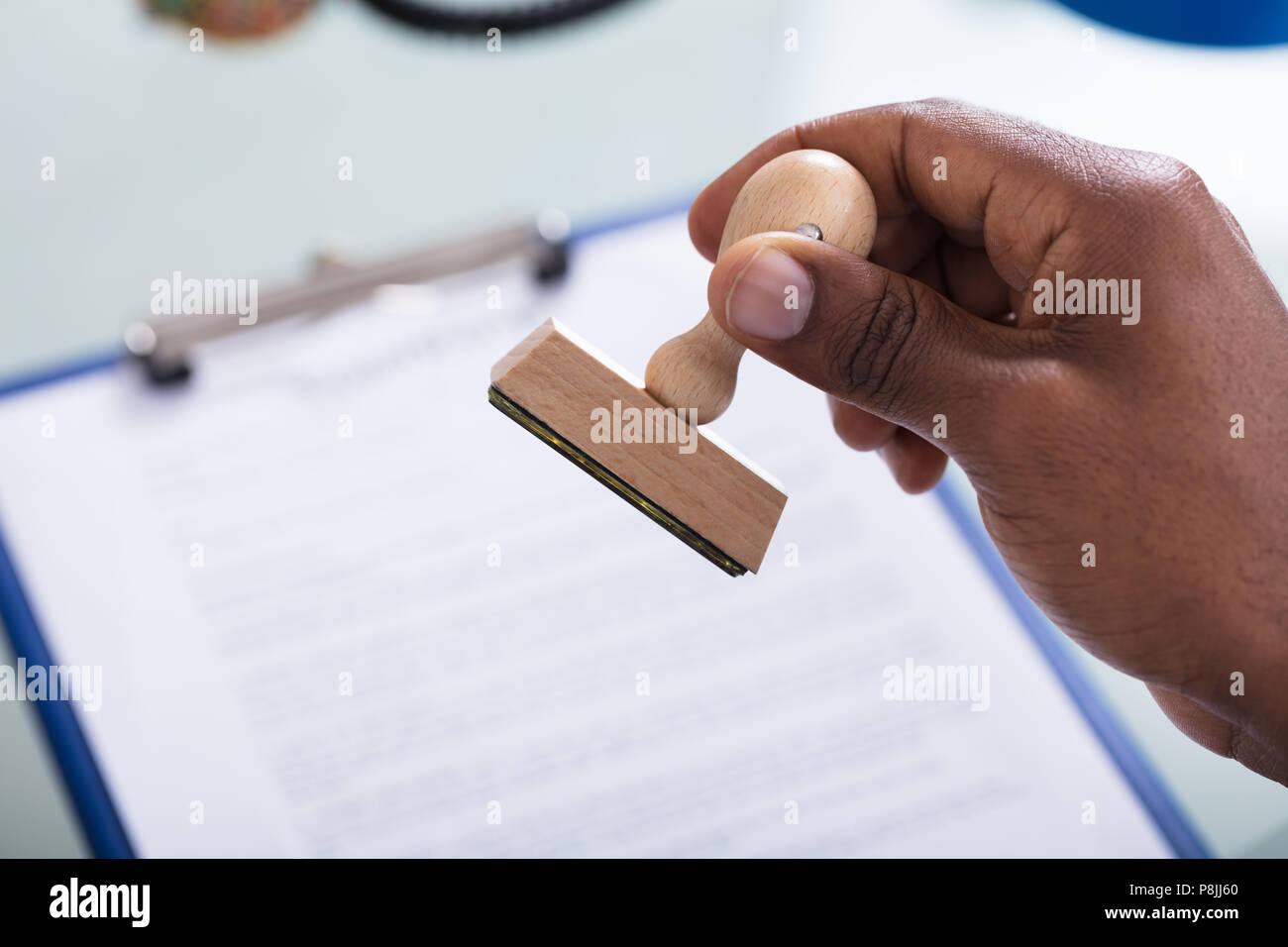 Hand stamp above hi-res stock photography and images - Alamy