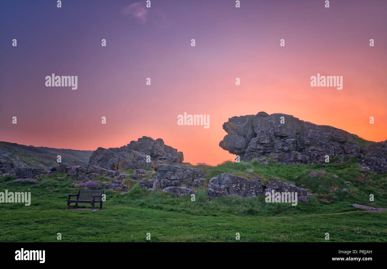 Large rock formations on the Cornish coast at dusk, St. Ives, Cornwall ...