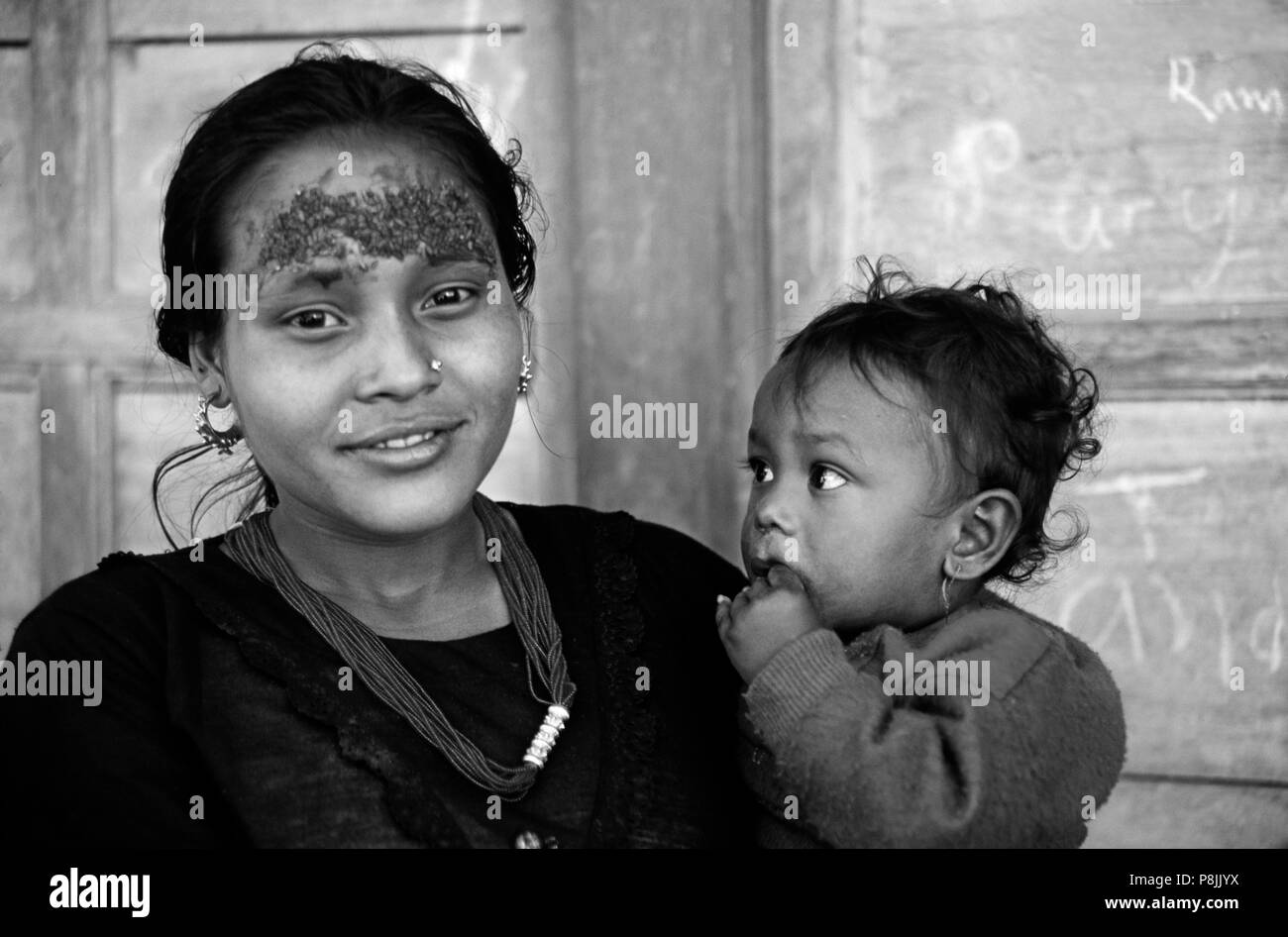 Nepali mother and child Black and White Stock Photos & Images - Alamy