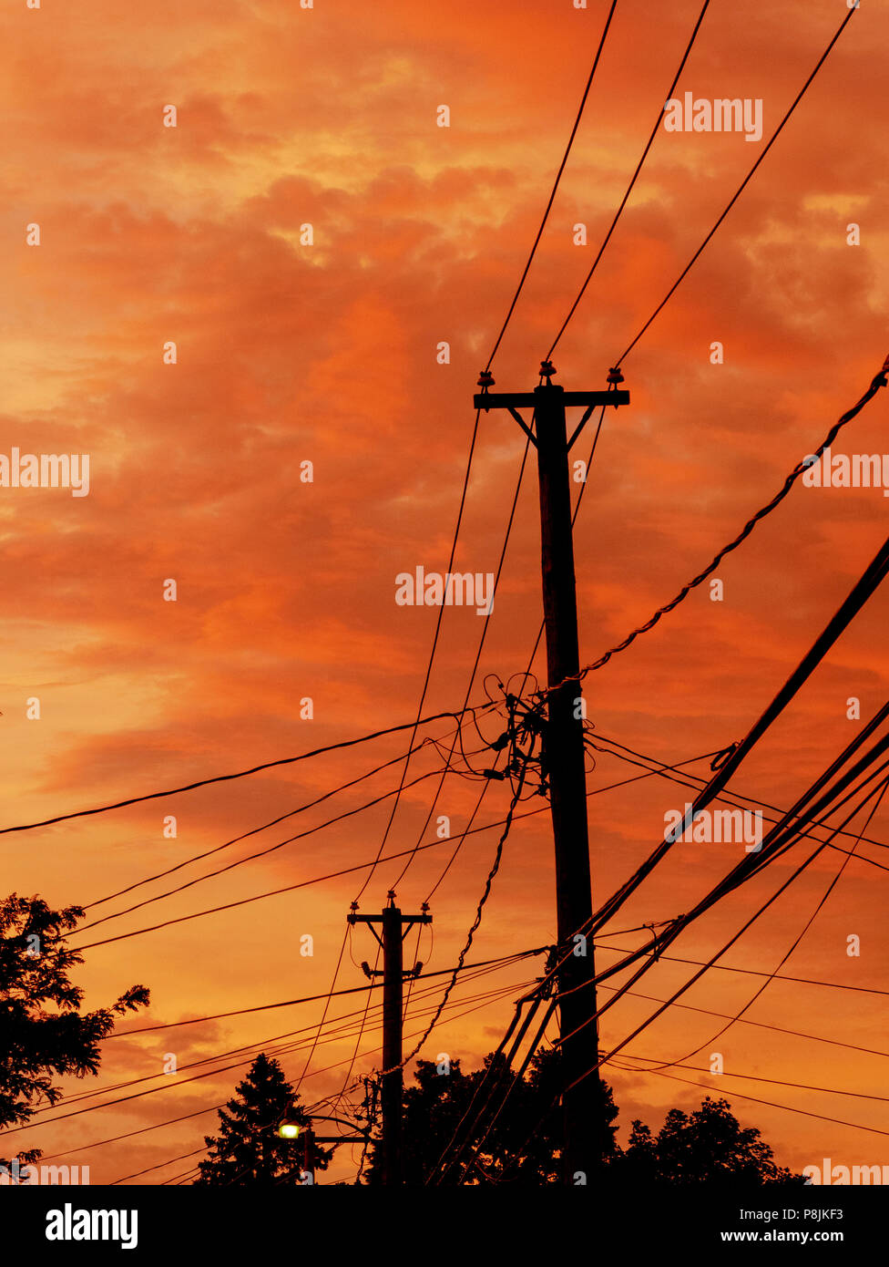 Power lines and colorful sky at dusk Stock Photo - Alamy