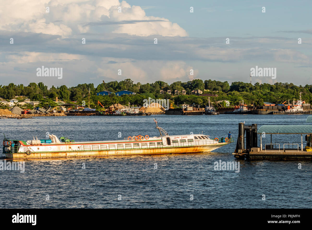 Fast ferries in Labuan harbour they bring people to and from the duty ...