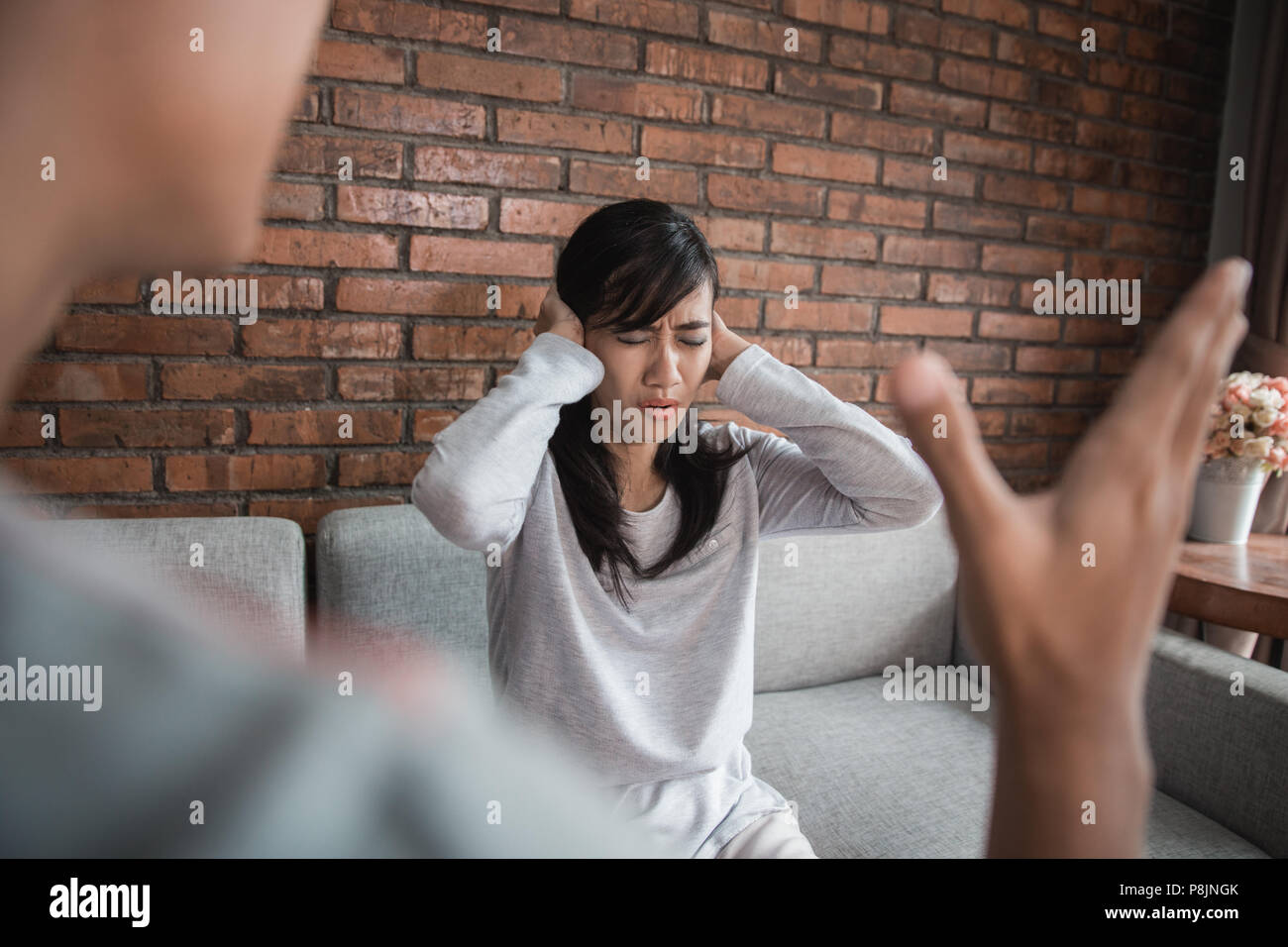 Couple hand ears hi-res stock photography and images - Alamy