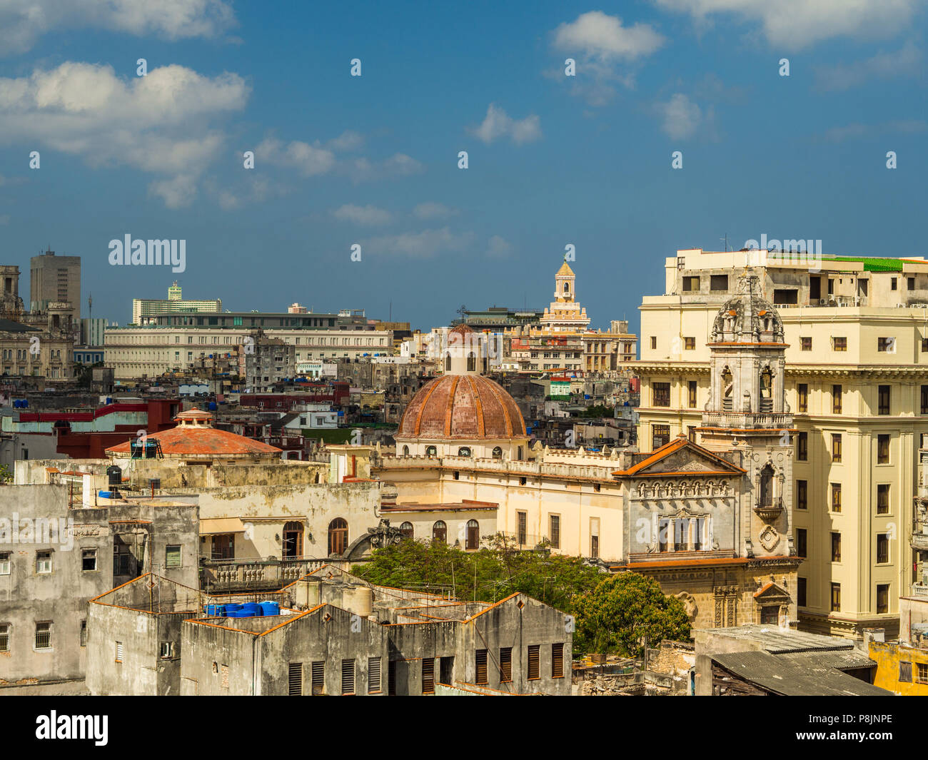 Havana streets with bright colours and cuban flags in sunny day Stock ...