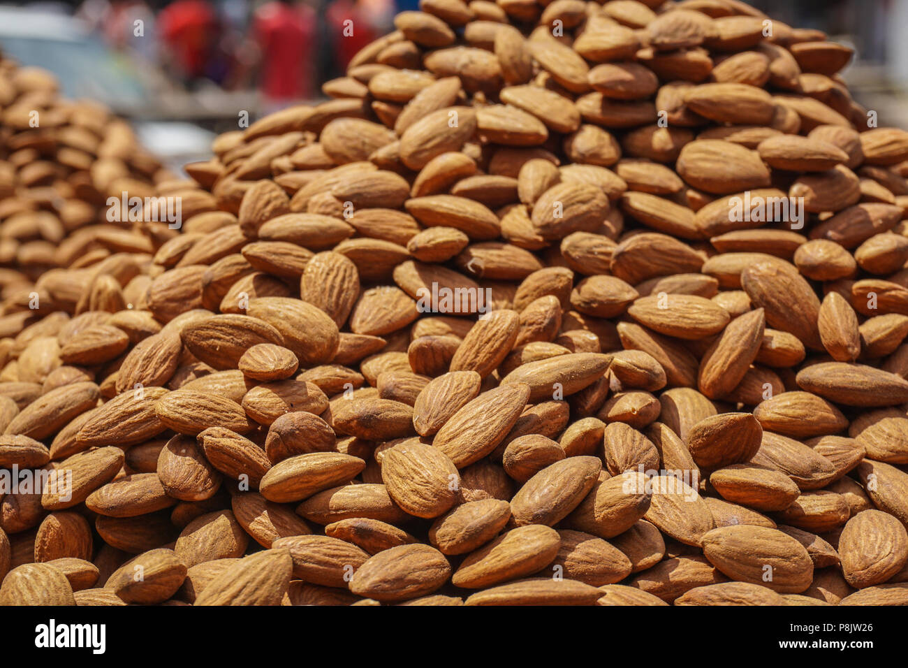 Almond nuts for sale at local market in Old Delhi, India Stock Photo ...