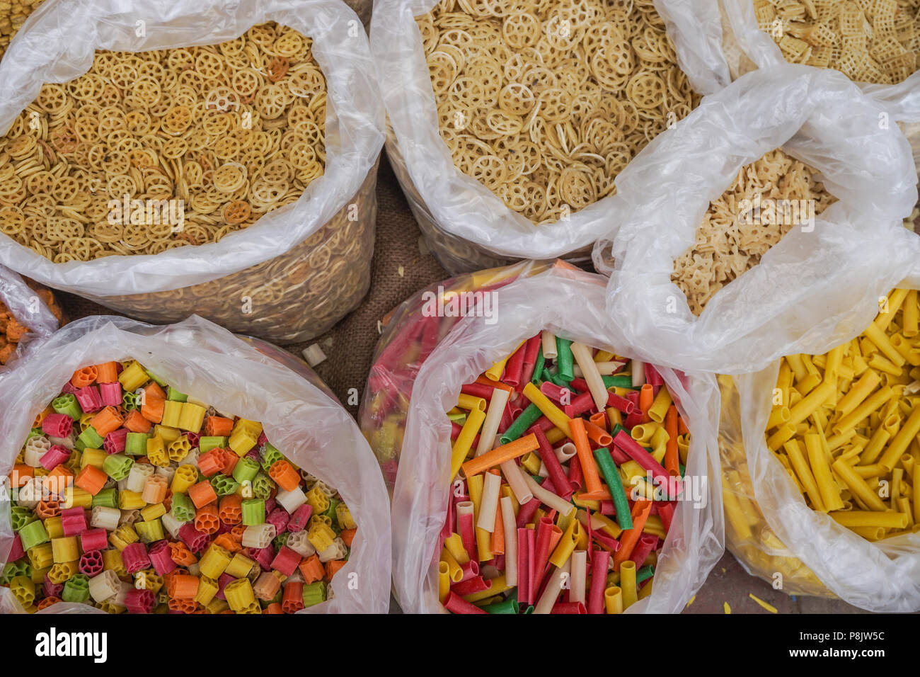Dried foods for sale at local market in Old Delhi, India Stock Photo ...