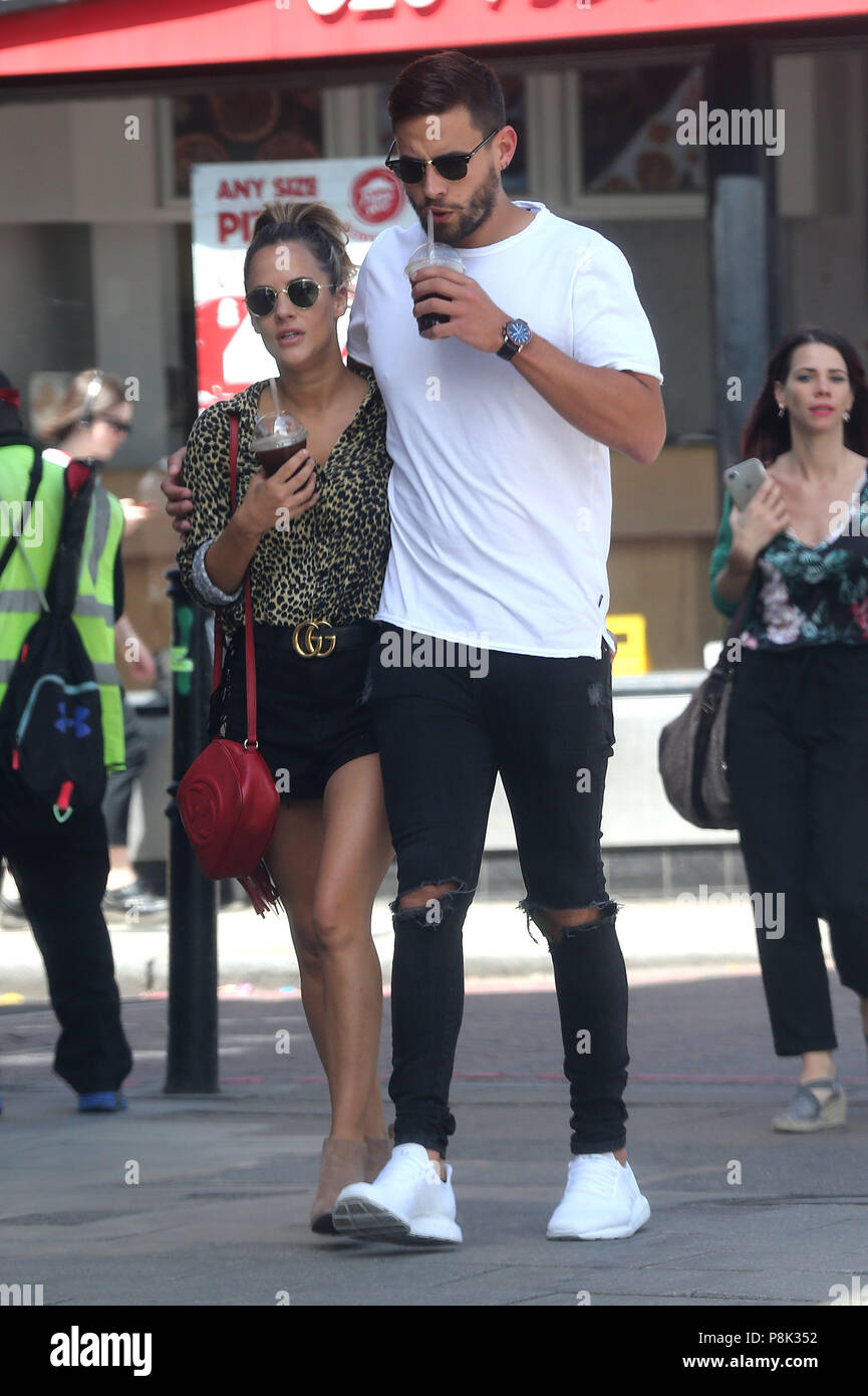 Caroline Flack and boyfriend Andrew Brady are seen walking around in ...