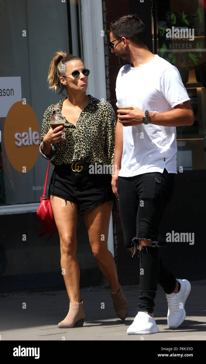 Caroline Flack and boyfriend Andrew Brady are seen walking around in ...
