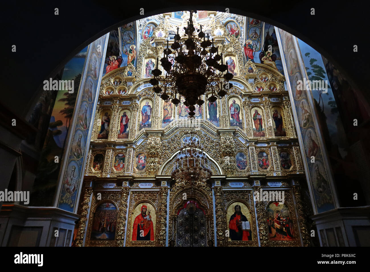 The iconostasis decorated with icons and religious paintings inside the reconstructed Cathedral ...
