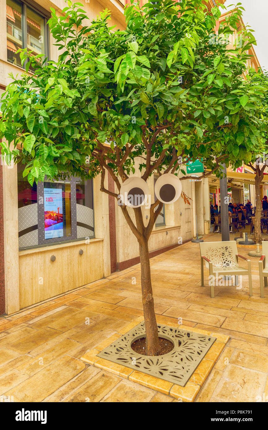 Funny eyes at Monaco streets Stock Photo - Alamy