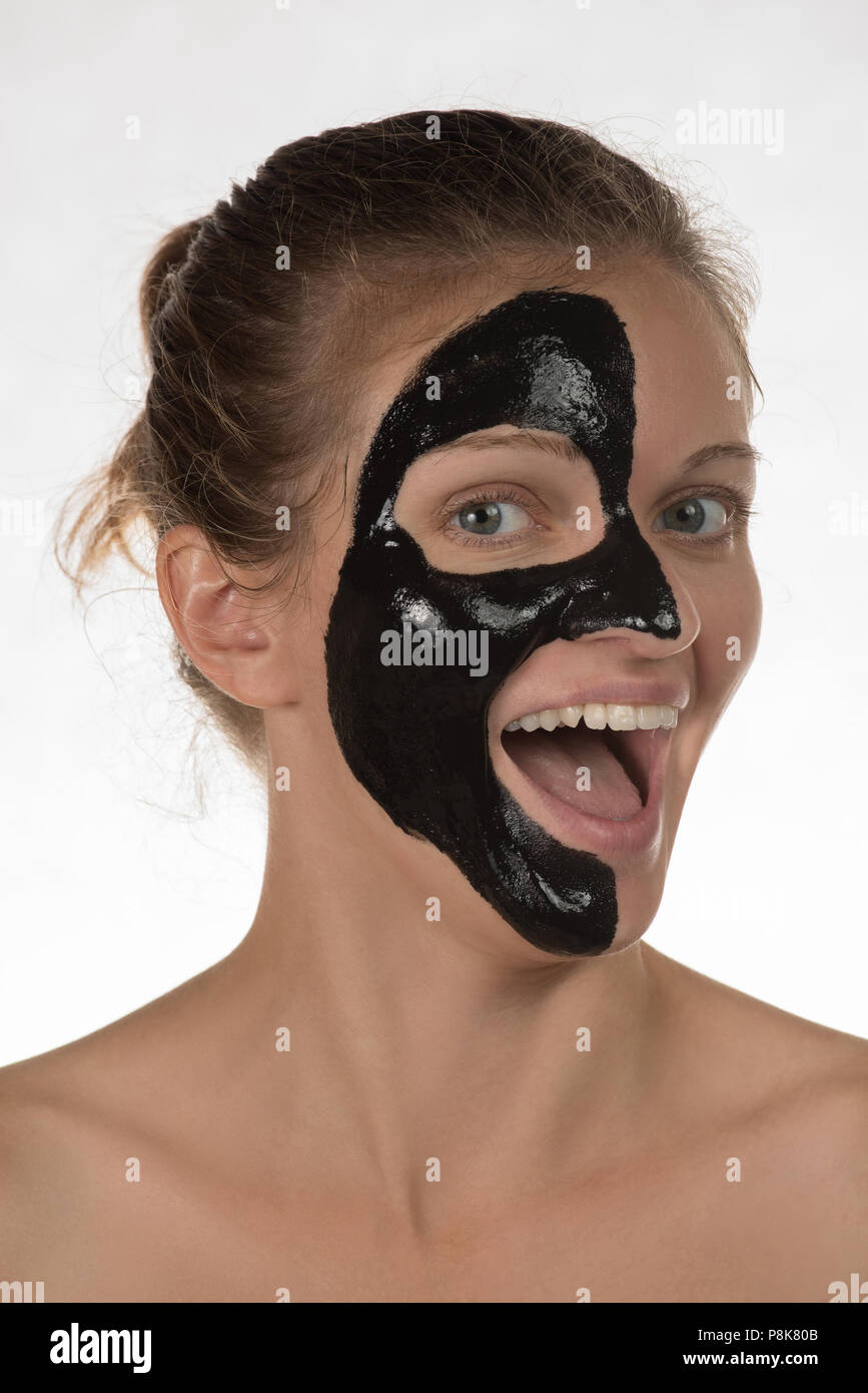 Happy beautiful girl with acne smiling on a white background in a ...